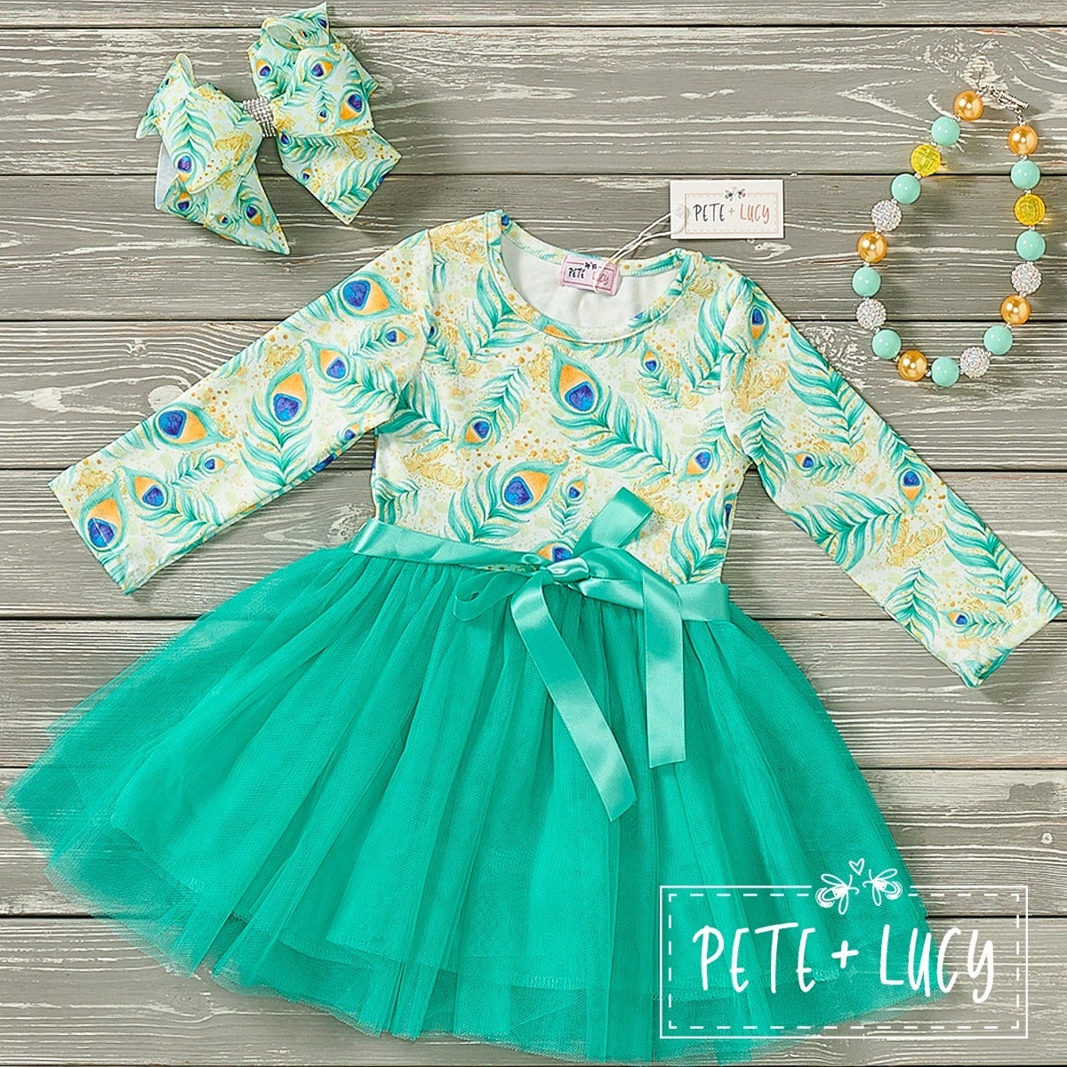 Pete + Lucy 'Beautiful Peacocks' dress | Designs by Arella